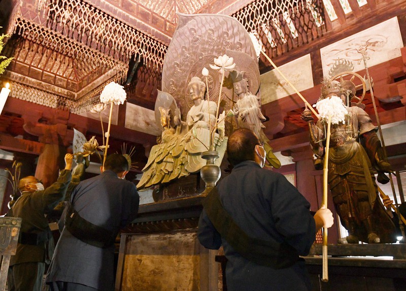 In Photos: Priests remove dust on Buddhist statues at Horyuji temple in ...