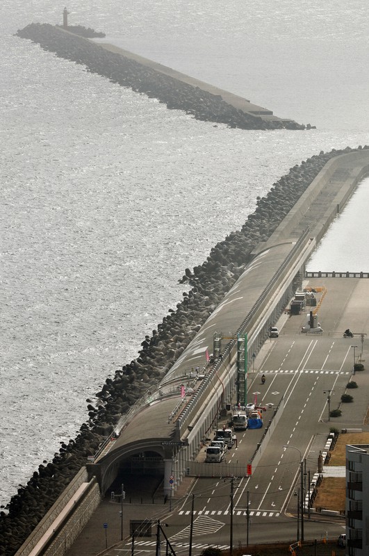 Retro Japan in Photos: Arched breakwater in Hokkaido, with a hint of ...