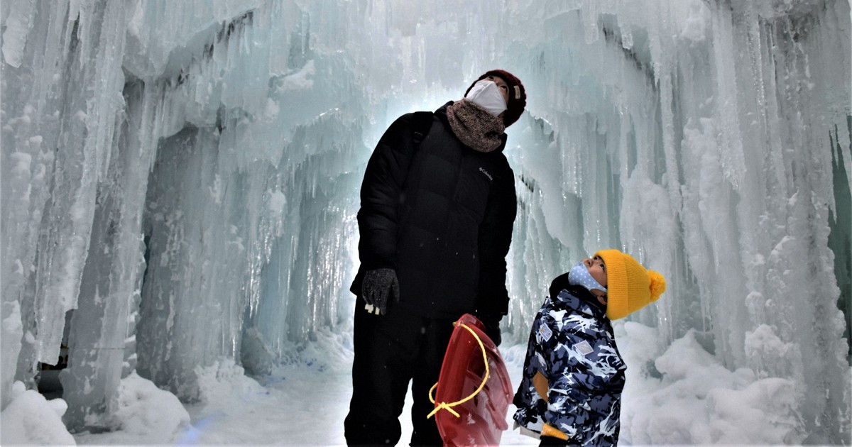 Huge ice cave welcomes visitors at 'ice world' festival in northeast ...
