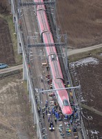 In Photos: Work to remove bullet train derailed by quake commences ...