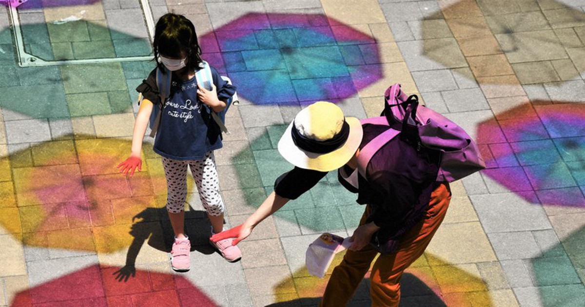 In Photos: Colorful umbrellas, animal cutouts adorn shopping mall in ...