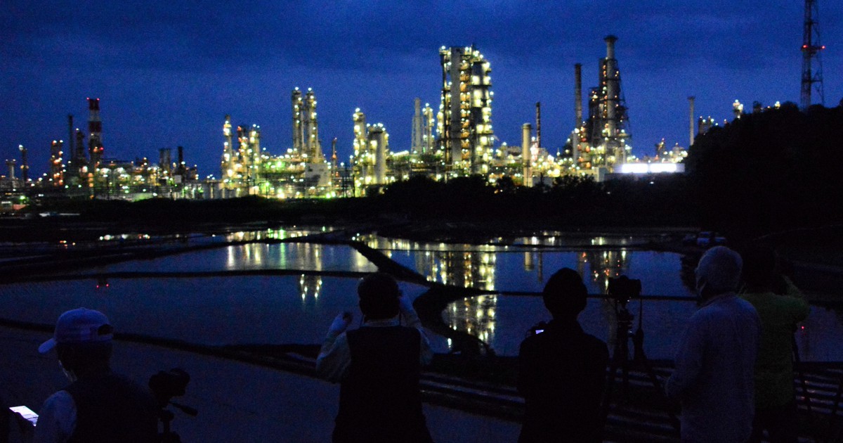 Japanese oil refinery reflected in rice paddies has photographers fired ...