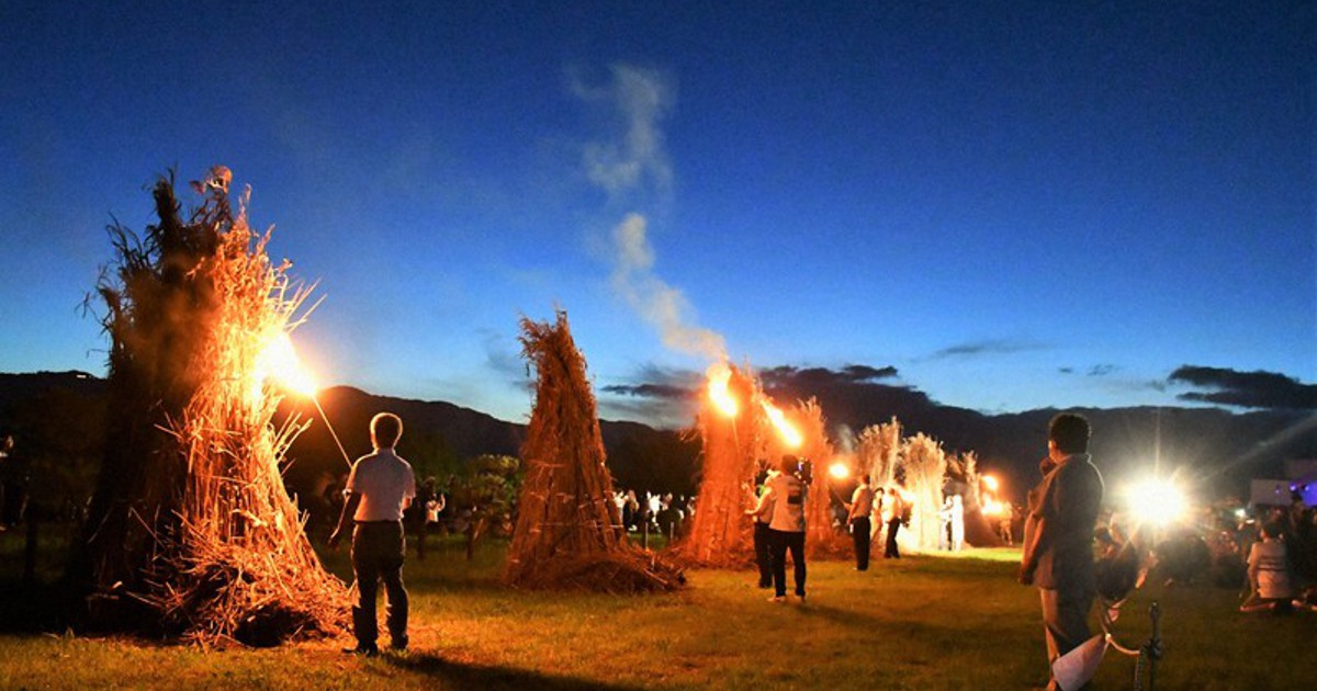 In Photos: Giant 'torches,' fireworks light up night sky on shore of ...