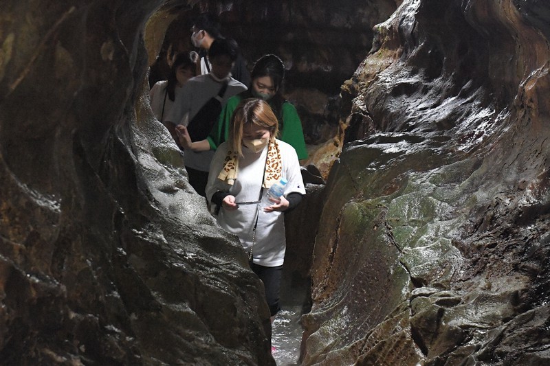 In Photos: Visitors chill out in southwest Japan limestone cave - The ...
