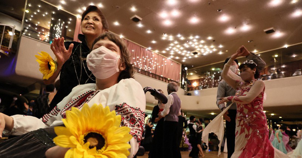 In Photos: Ukrainian evacuee makes dream come true with wheelchair ...