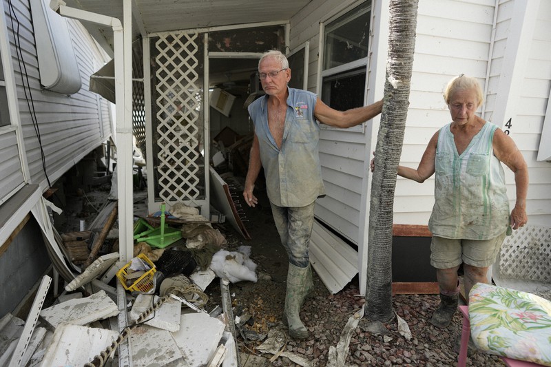 Hurricane Ian death toll hits 101 as evacuees return to mud, rubble ...