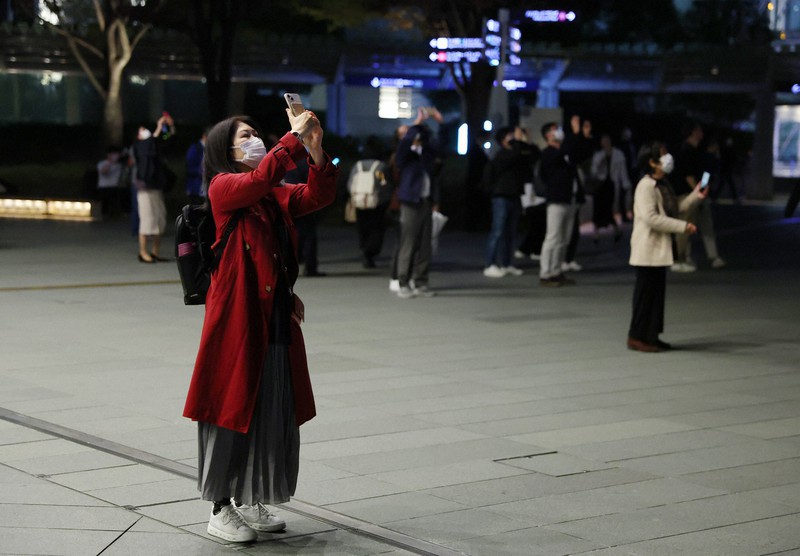 In Photos: Total lunar eclipse enthralls people across Japan in rare ...