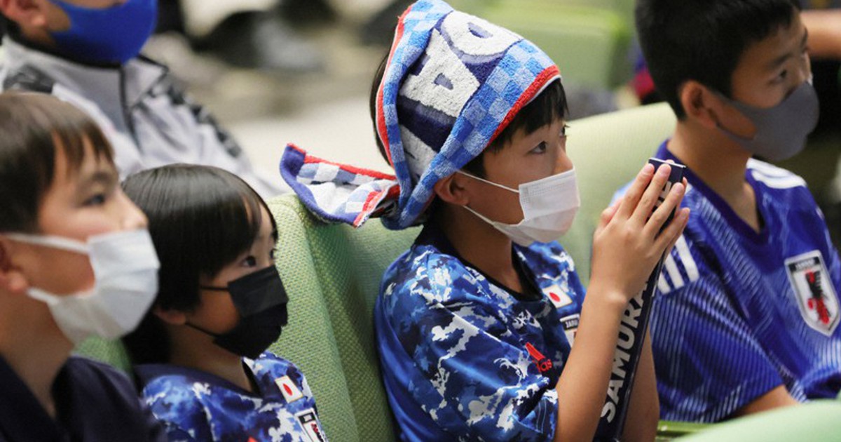 In Photos: Japan soccer fans' hopes dashed in World Cup match against ...