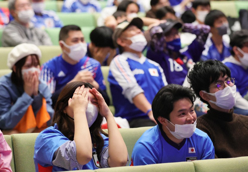 In Photos: Japan soccer fans' hopes dashed in World Cup match against ...