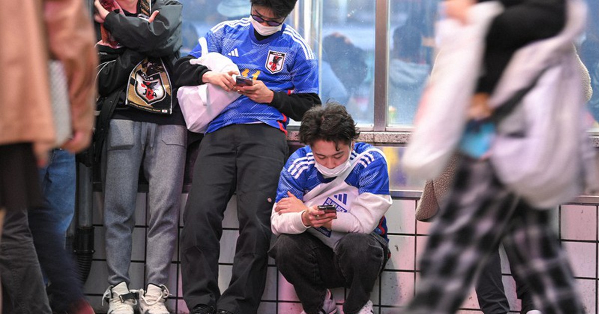 In Photos: Japan soccer fans' hopes dashed in World Cup match against ...