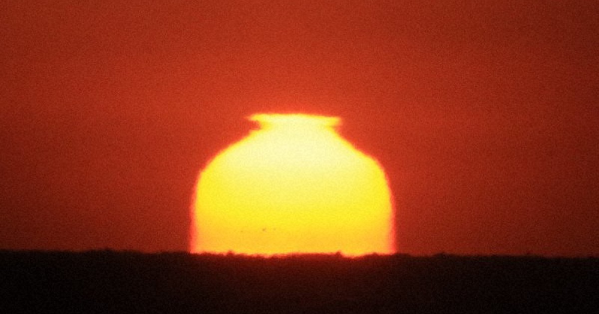 Amateur shutterbug in Japan snaps rare 'turned-over soup bowl' sunrise - The Mainichi
