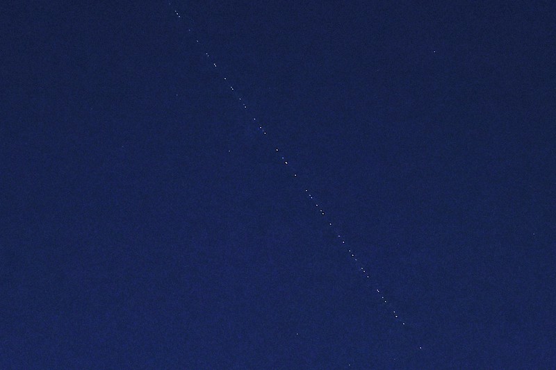 Line of lights from SpaceX's 'Starlink' satellites observed from ...