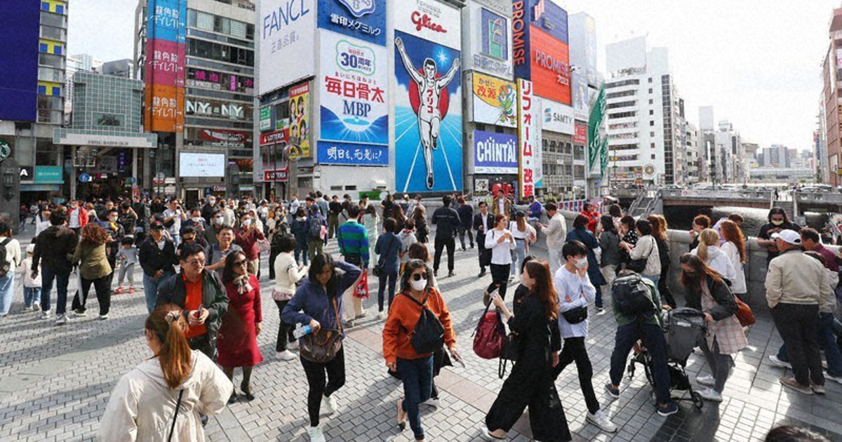 Downtown Osaka bustling again as COVID downgraded to same as flu - The ...