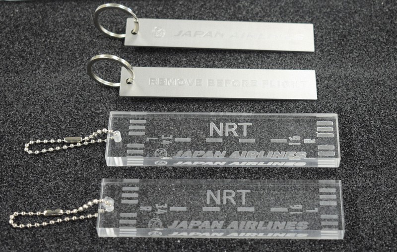 In Photos: Japan Airlines mechanics make key chains, tags from aircraft ...
