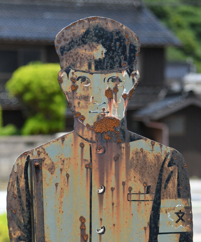 In Photos: Ghostly uniformed figures keep silent watch over west Japan ...