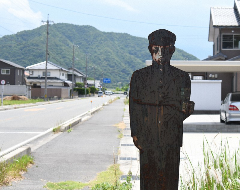 In Photos: Ghostly uniformed figures keep silent watch over west Japan ...