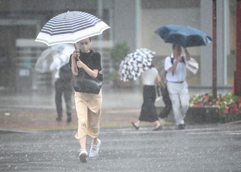 Torrential rain in Japan's Kyushu sparks evacuation orders, causes ...