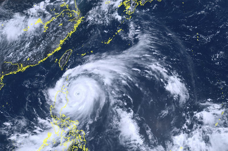 Strong typhoon blows closer to northern Philippines, forcing ...