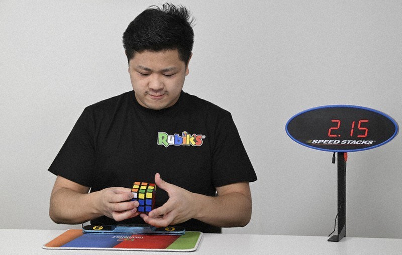 'Tremendous opportunity to meet the world': Rubik's Cube champ, parents ...