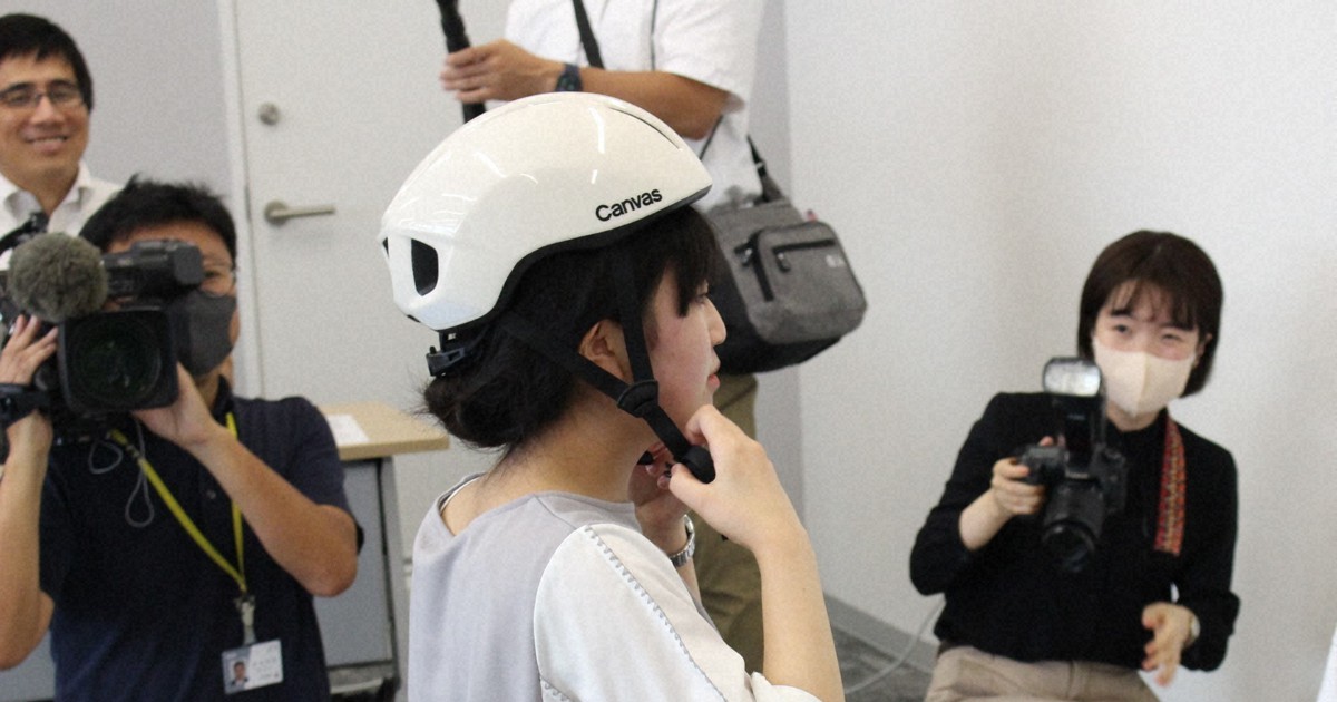 Univ. students in Japan come up with helmet-friendly hairstyles to ...
