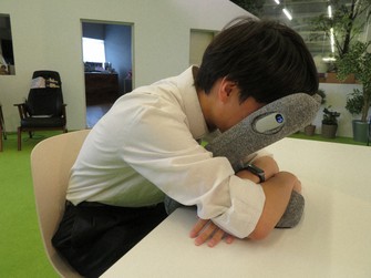 Napping on the job? Pillows to help workers snooze at desk draw ...