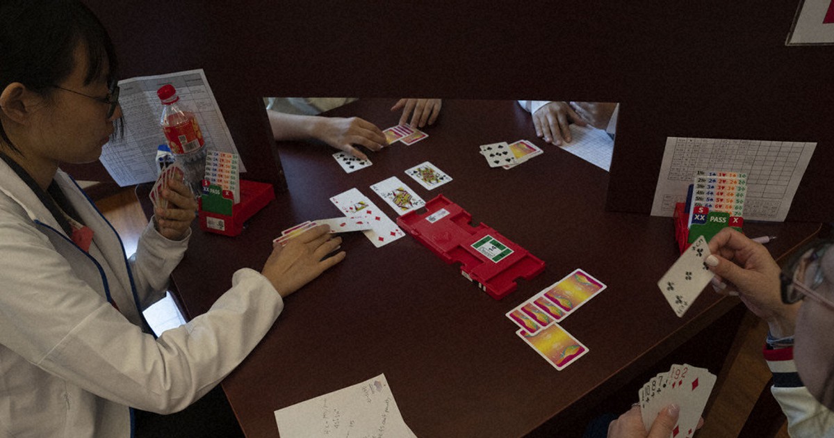 The centuries-old card game of bridge offers a sharp contrast to ...