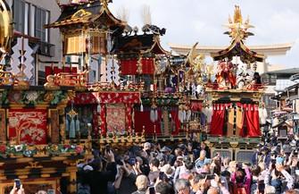 Extravagant floats parade through central Japan city in autumn festival ...