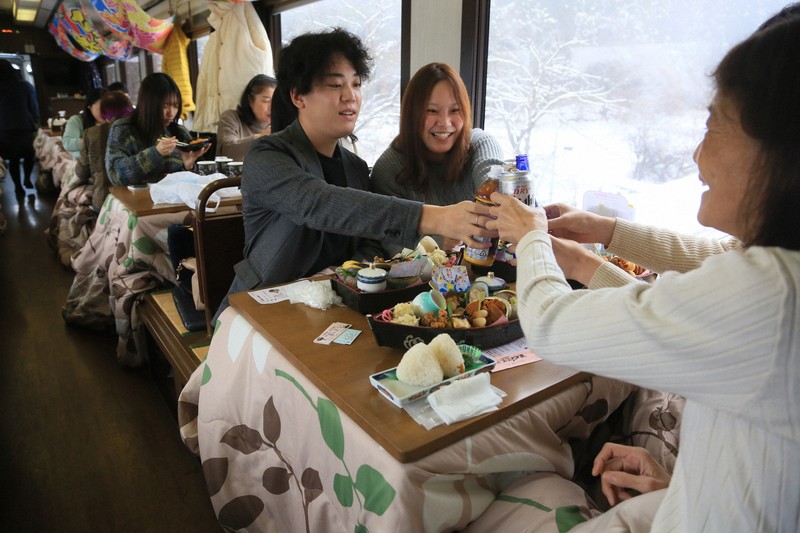 Sightseeing train with 'kotatsu' heated tables delights passengers in ...