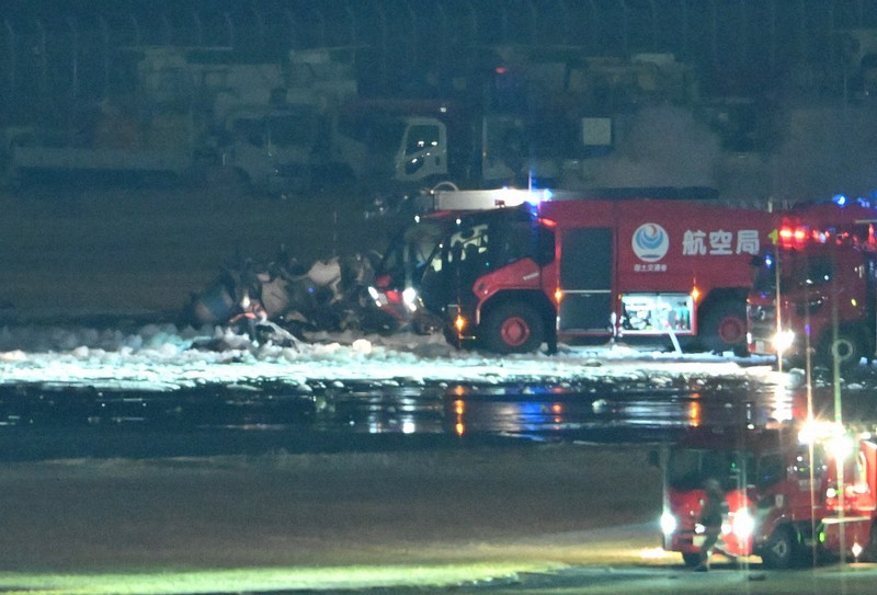In Photos: Japan Airlines plane catches fire after collision at Tokyo's ...