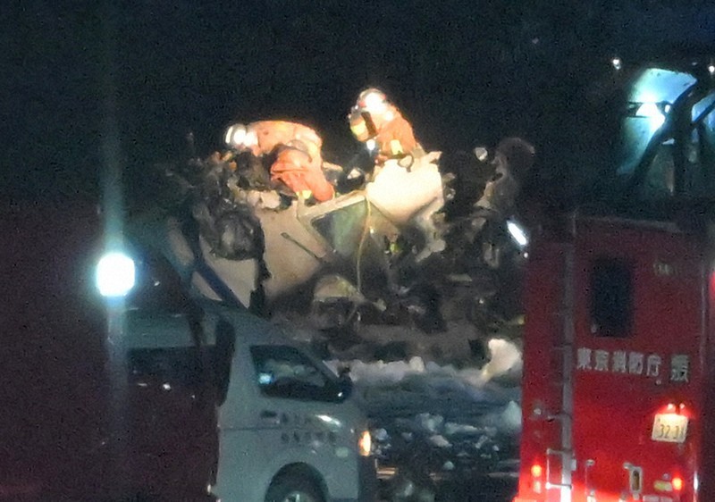 In Photos: Japan Airlines plane catches fire after collision at Tokyo's ...