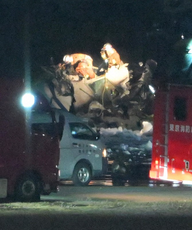 In Photos: Japan Airlines plane catches fire after collision at Tokyo's ...
