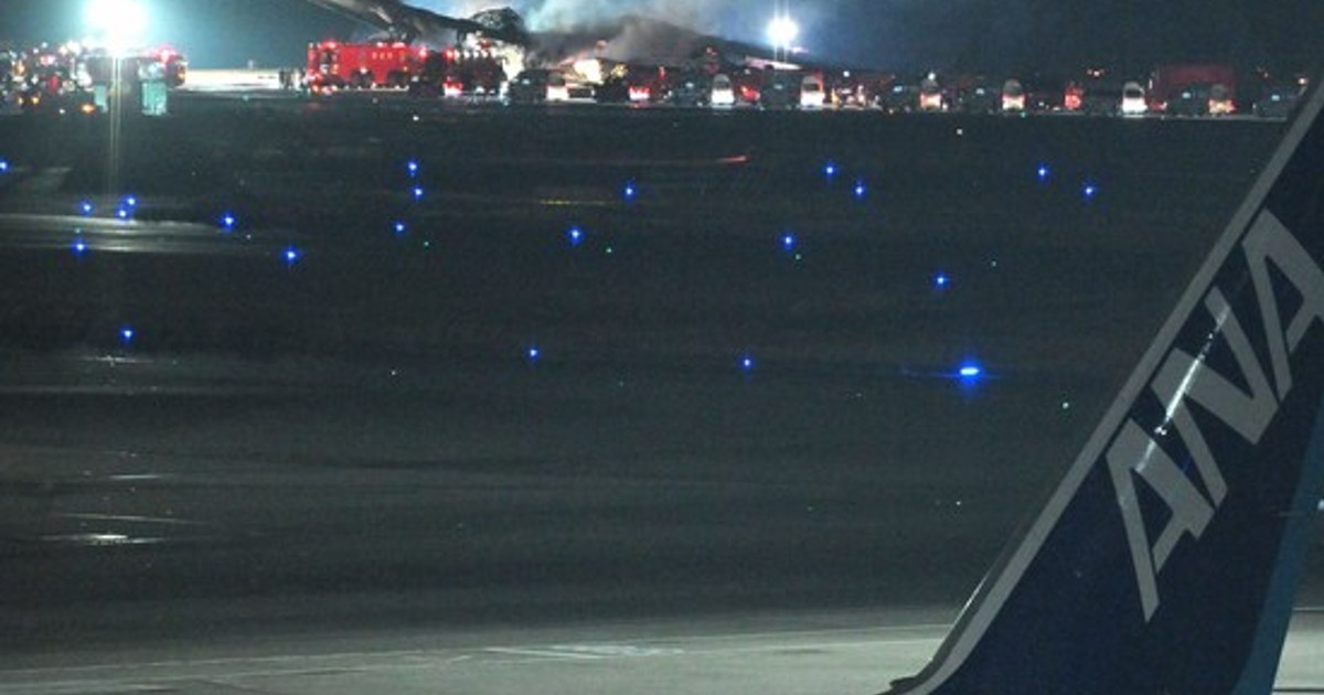In Photos: Japan Airlines plane catches fire after collision at Tokyo's ...