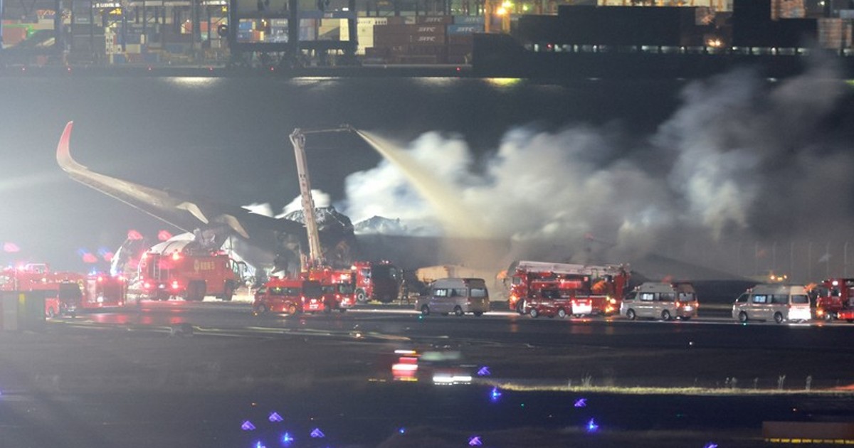 In Photos: Japan Airlines plane catches fire after collision at Tokyo's Haneda airport - The ...