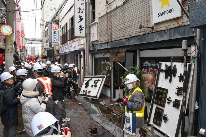 In Photos: Southwest Japan shopping street severely damaged by fire ...