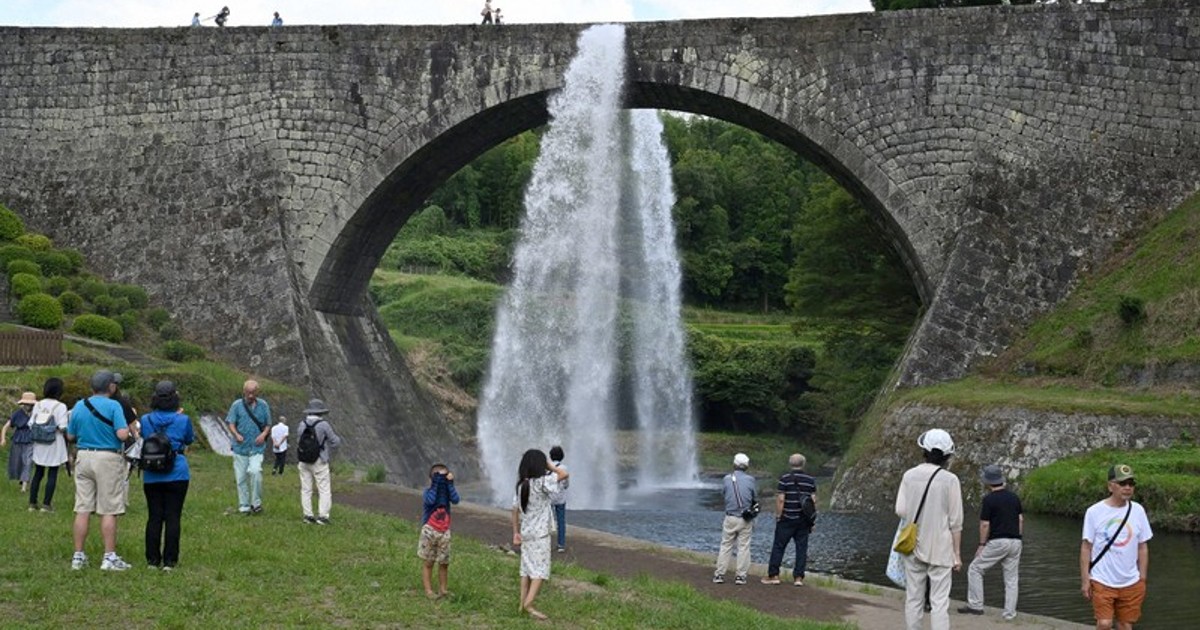 In Photos: Tsujun Bridge in southwest Japan lit up with colorful ...