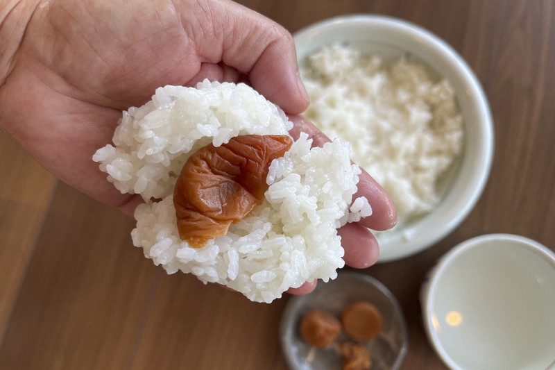 A simple recipe for onigiri, or Japanese rice balls, with salted plums ...