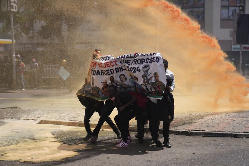 Anti-tax protesters storm Kenya's parliament, drawing police fire as ...