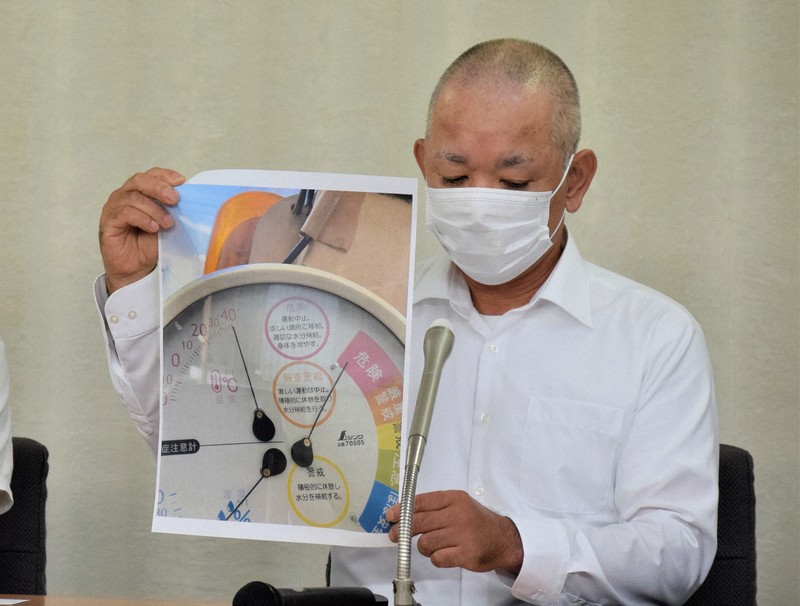 Japan courier worker goes on solo strike over heatstroke-inducing work ...