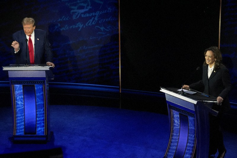 Debate opens with tense disputes between Trump and Harris over economy ...