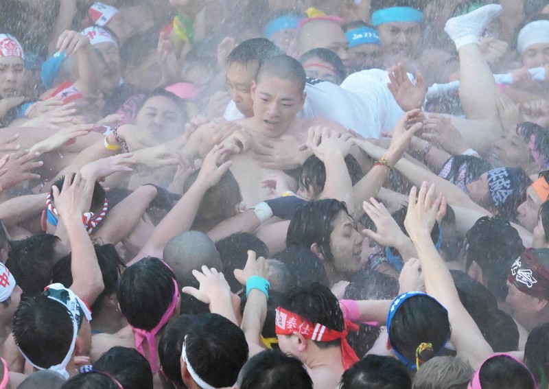 Thousands of men clash for good luck during 'naked' festival in central ...
