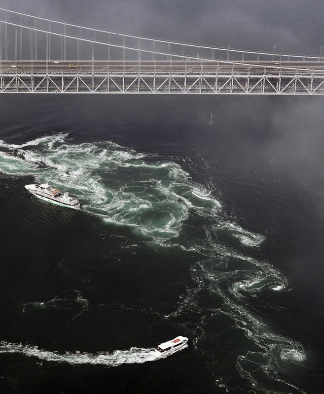 In Photos: Giant spring whirlpools attract tourists in west Japan - The ...