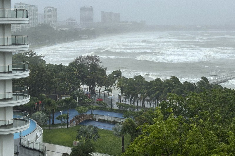 Typhoon lands on China's Hainan island at severe tropical storm level ...