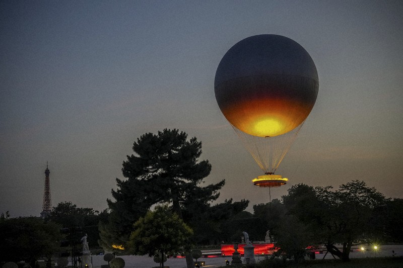 Paris' iconic cauldron from the Olympic Games returns to light up ...