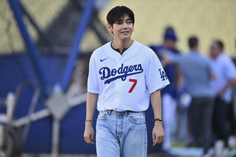 V of K-pop sensation BTS thrills fans with first pitch at Dodgers game and meets Shohei Ohtani ...