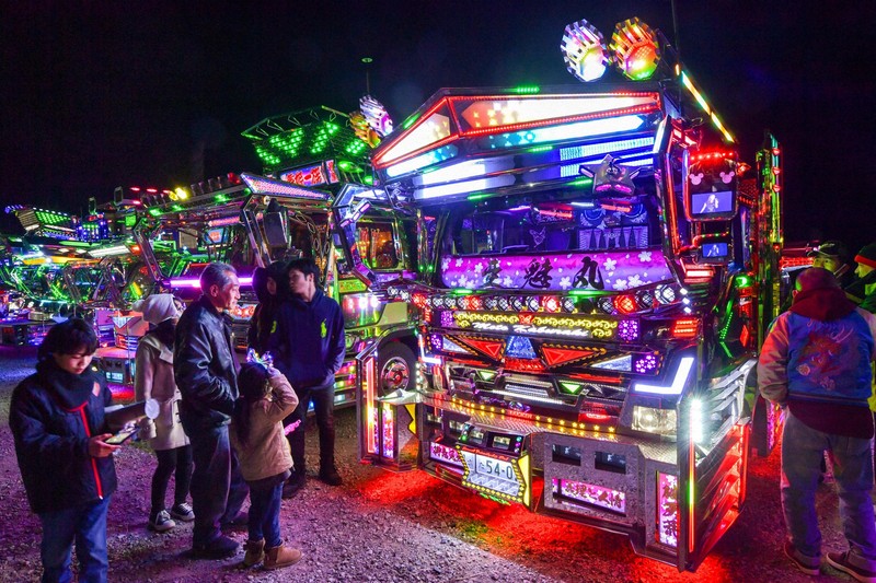 Japan's neon-decorated trucks dazzle for New Year's disaster relief ...