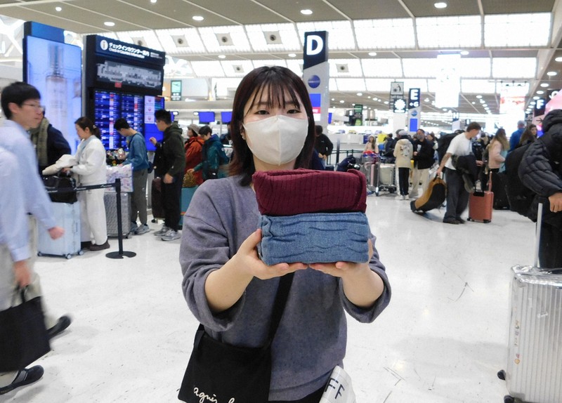 Narita Airport tests clothing compression machine to curb abandoned ...